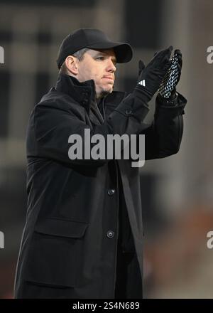Manchester United's head coach Marc Skinner speaks with the media ...