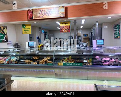 People and groceries inside Morrisons supermarket checkout counter ...