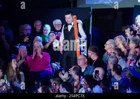 Ding Junhui's walk on during first round match Judd Trump and Ding ...