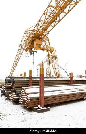 overhead crane over outdoor warehouse with metal products Stock Photo ...