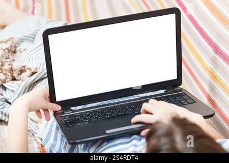 Girl works on a laptop at home at night Stock Photo - Alamy