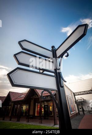 Four street signs, Blank sign post, sign the post with four blank signs ...