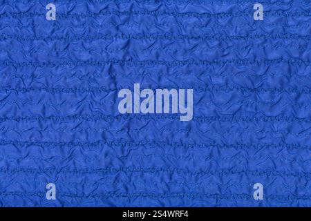textile background from stitched wrinkled blue silk fabric Stock Photo ...