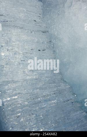 Glacial block of ice with interesting structure crystals macro. Winter ...