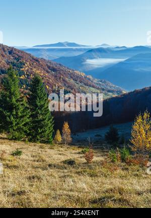 Mist between the mountain peaks Stock Photo - Alamy
