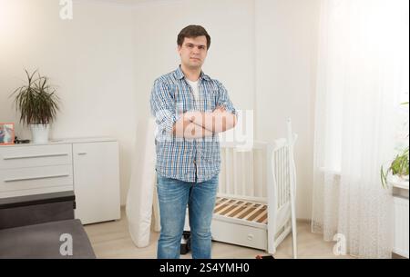 Baby room interior with crib. House design Stock Photo - Alamy