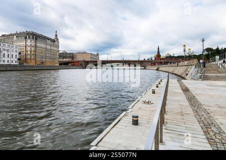 view of Moskva river with waterfront in Kolomna city on sunny summer ...
