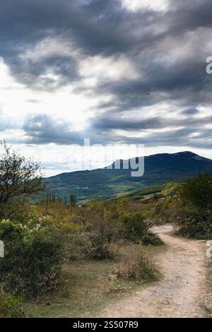 dark gray clouds over mountan valley in Crimea Stock Photo - Alamy