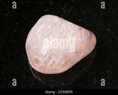 polished morganite (pink beryl) gemstone on white Stock Photo - Alamy