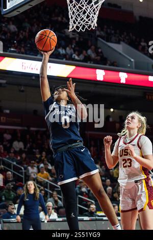 Southern California guard Avery Howell (23) reacts with teammates ...