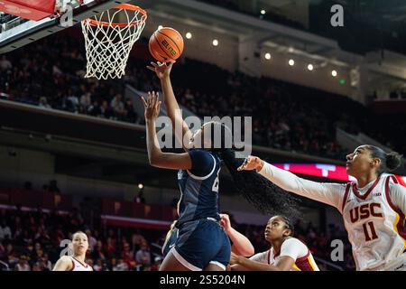 USC guard Kennedy Smith (11) attempts to block a shot by Indiana guard ...