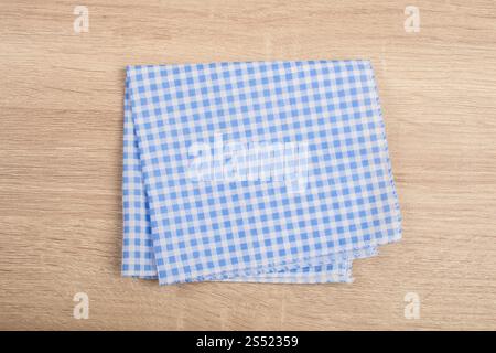 Blue table napkins isolated on white background Stock Photo - Alamy