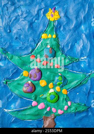Christmas card with xmas tree made with flour on dark background with ...