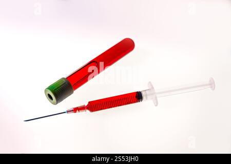 Syringe and test tube with blood isolated on white background Stock ...