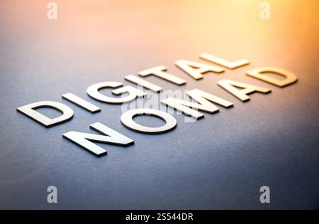 DIGITAL NOMAD LIFESTYLE word written on dark paper background Stock ...