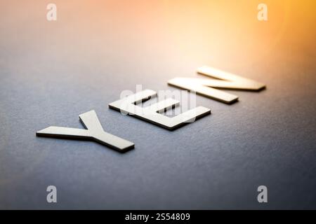 Word YEN written with white solid letters on a board Stock Photo - Alamy