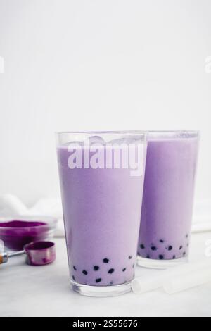 Two Glasses of Purple Sweet Potato Bubble Tea: Ube boba with ice cubes ...