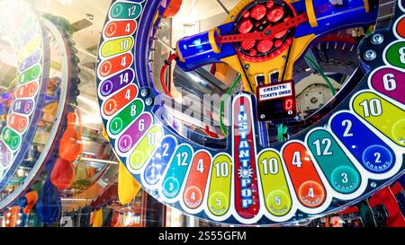 Closeup image of colroful illuminated round display in casino or ...