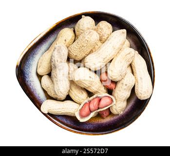 Raw peeled peanuts on bowl. Selective focus Stock Photo - Alamy