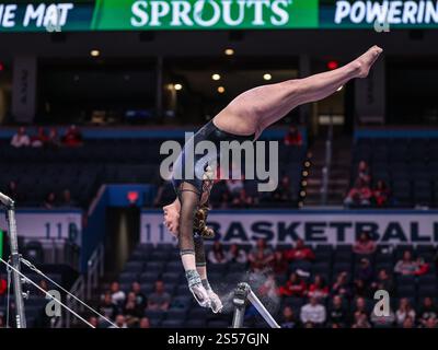 Kentucky's Ryan Noonan competes on the uneven bars during an NCAA ...