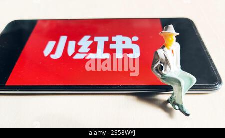 A Little Red Book LOGO is displayed on a smartphone in Shanghai, China ...