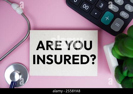 Insured Concept text on background Stock Photo - Alamy