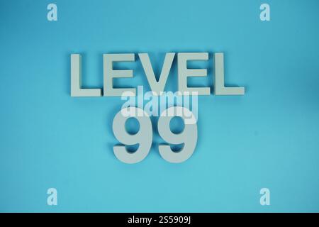 Level 99 Level Ninety-nine alphabet letters on navy blue background ...