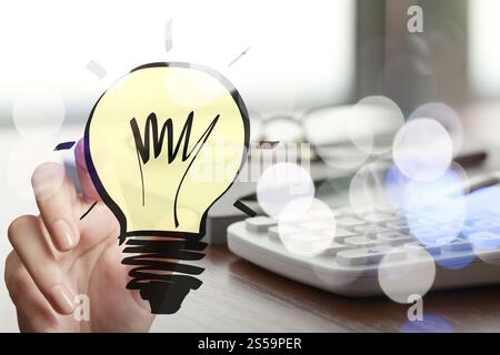 hand drawing creative business strategy with light bulb as concept ...