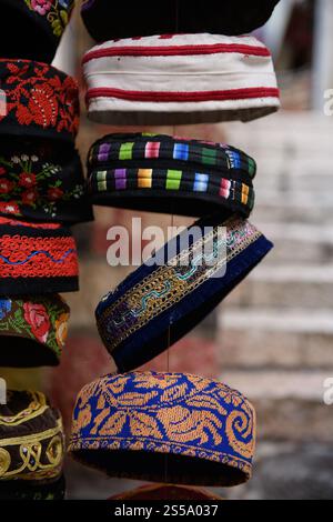 Colorful, patterned variety of yarmulkes or skull caps, worn by ...