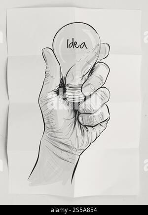 Light bulb on light grey paper background Stock Photo - Alamy