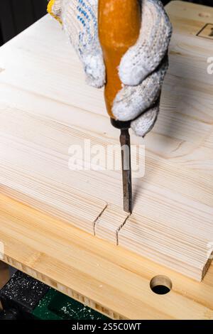 A carpenter using a chisel Stock Photo - Alamy