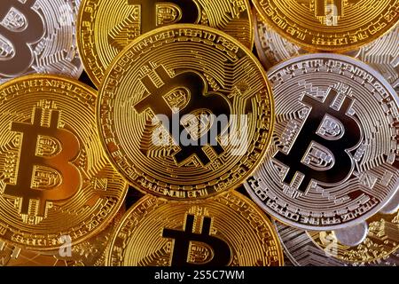 Many golden bitcoins. Cryptocurrency and virtual money concept. Shiny ...