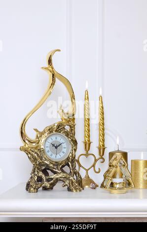 Black vintage alarm clock with christmas baubles and decor on dark ...