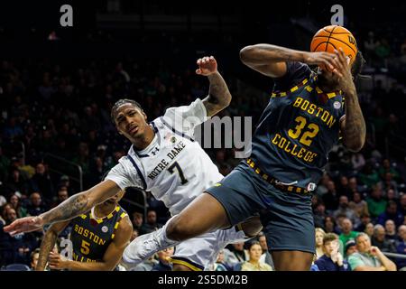 Boston College forward Chad Venning (32) and North Carolina guard Ian ...