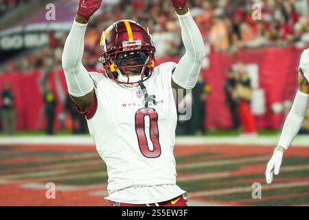 Washington Commanders cornerback Mike Sainristil (0) works out during ...