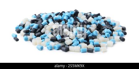 Pile of colorful plastic granules isolated on white Stock Photo - Alamy