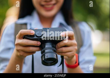 hand holding digital camera, traveling concept Stock Photo - Alamy