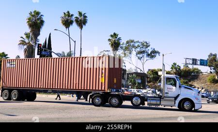 Freight Truck carrying a BEACON shipping container on a street toward ...