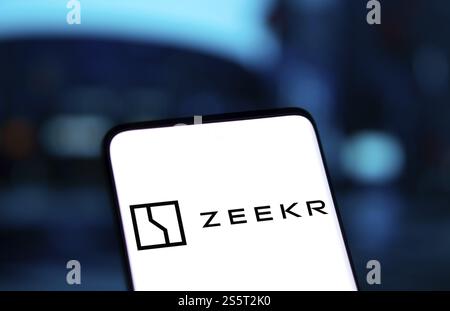 Zeekr logo is displayed on smartphone. Zeekr Technology Group is a ...