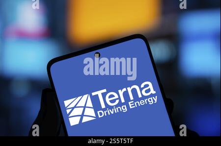 Terna driving energy logo is displayed on smartphone. Terna S.p.A. is a ...