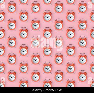 Red alarm clock on the color background Stock Photo - Alamy