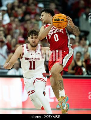 Ohio State's John Mobley Jr., right, looks to pass the ball as Illinois ...