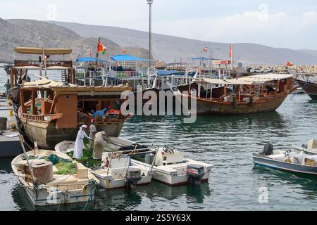 Traditional wooden fishing dhows docked in the Doha corniche Stock ...