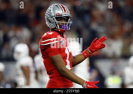 Ohio State wide receiver Carnell Tate (17) carries the ball after a ...