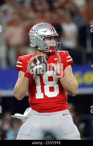 Ohio State quarterback Will Howard smiles as he warms up at the NFL ...