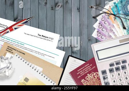 English form sa100 Tax return by HM revenue and customs lies on table ...