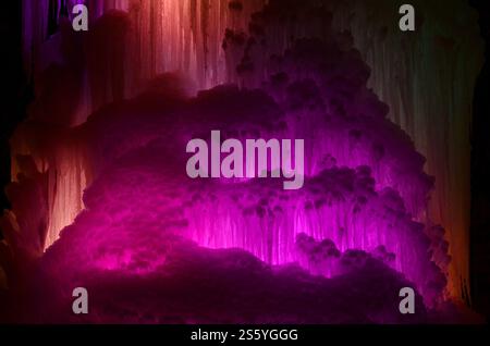 Huge ice icicles. Fragment of large blocks of ice frozen waterfall of ...