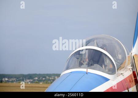 Cabin of armoured fighter aircraft close up against blue sky background ...