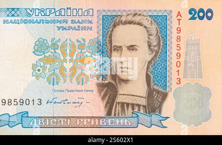 Banknote of 200 hryvnia, close-up. Portrait of poetess Lesya Ukrainka ...