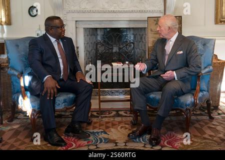 King Charles III holds an audience with Sir Errol Charles Governor ...